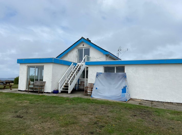 Anglesey approves cliff-top house rebuild despite 'overdevelopment ...